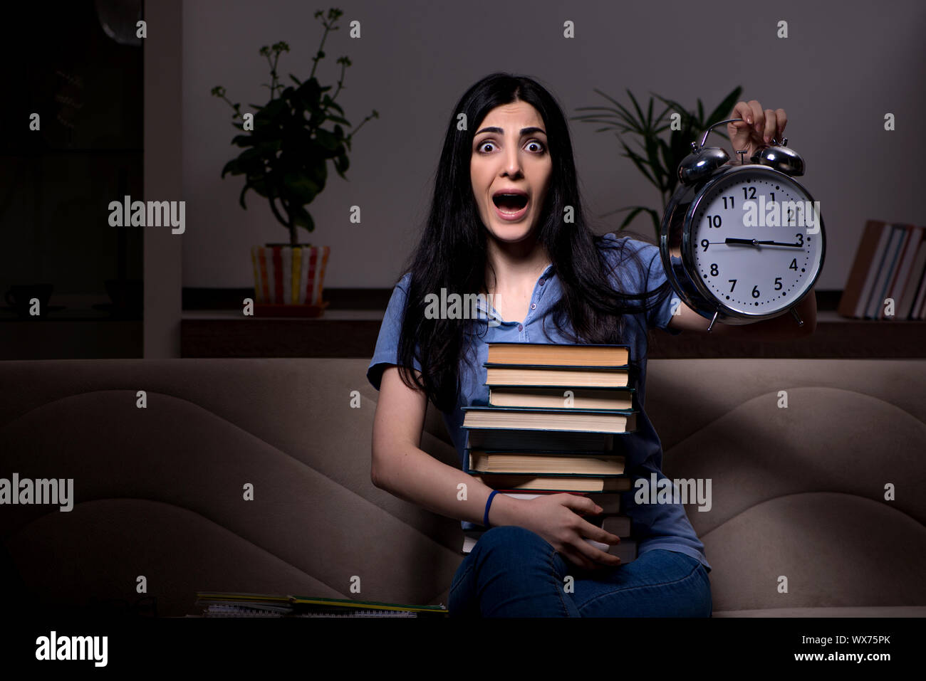 Stressed female student clock hi-res stock photography and images - Alamy