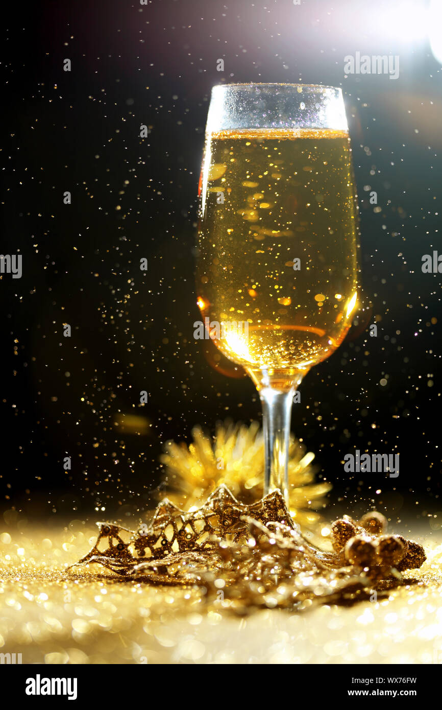 Champagne with golden decorations Stock Photo - Alamy