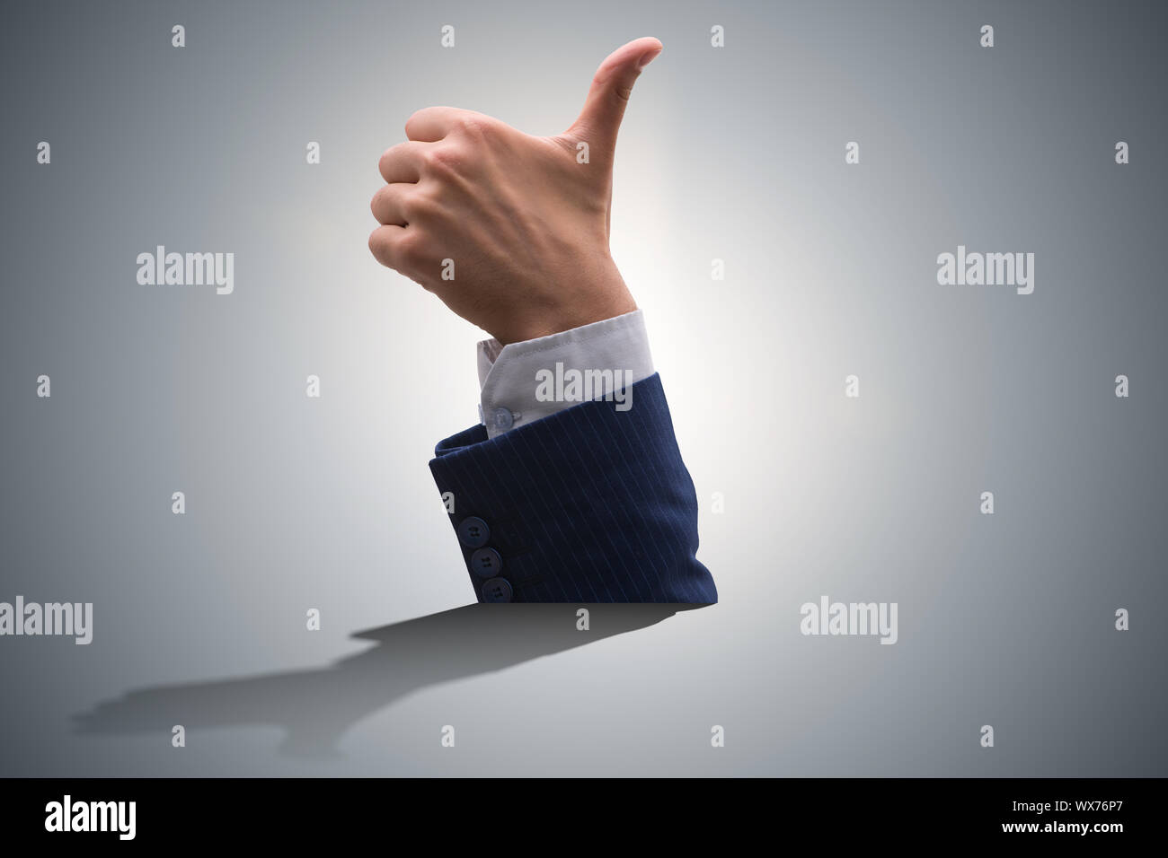 Male hand with thumbs up approval gesture Stock Photo - Alamy