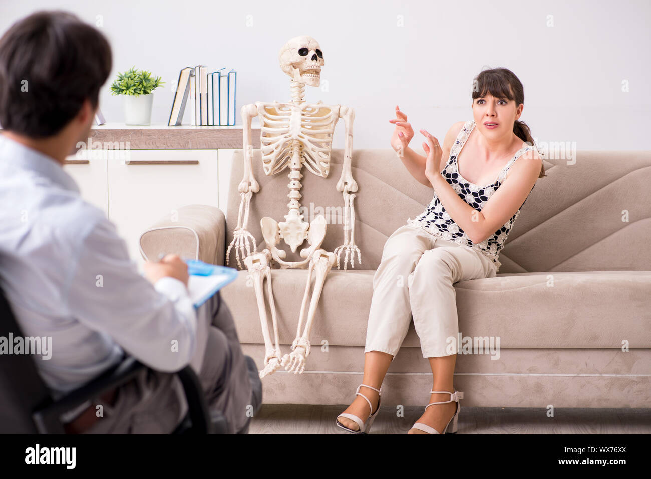 Young patient visiting psychologist for therapy Stock Photo - Alamy