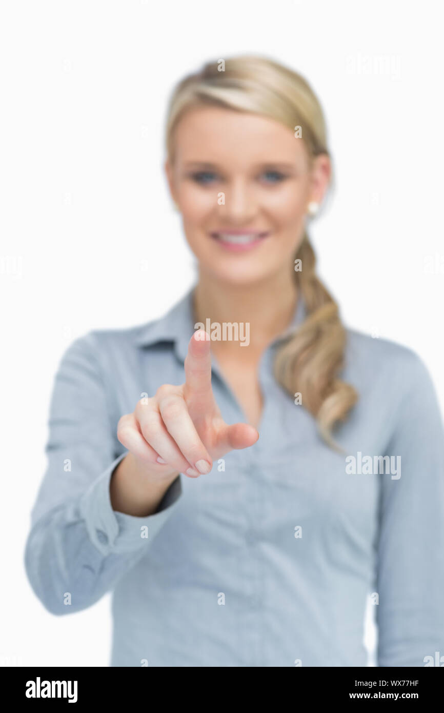 Woman pointing at something Stock Photo - Alamy