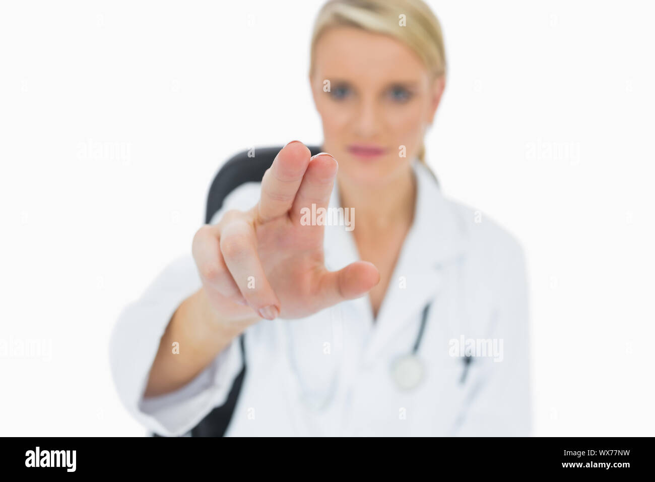 Female doctor touching on something ahead Stock Photo - Alamy