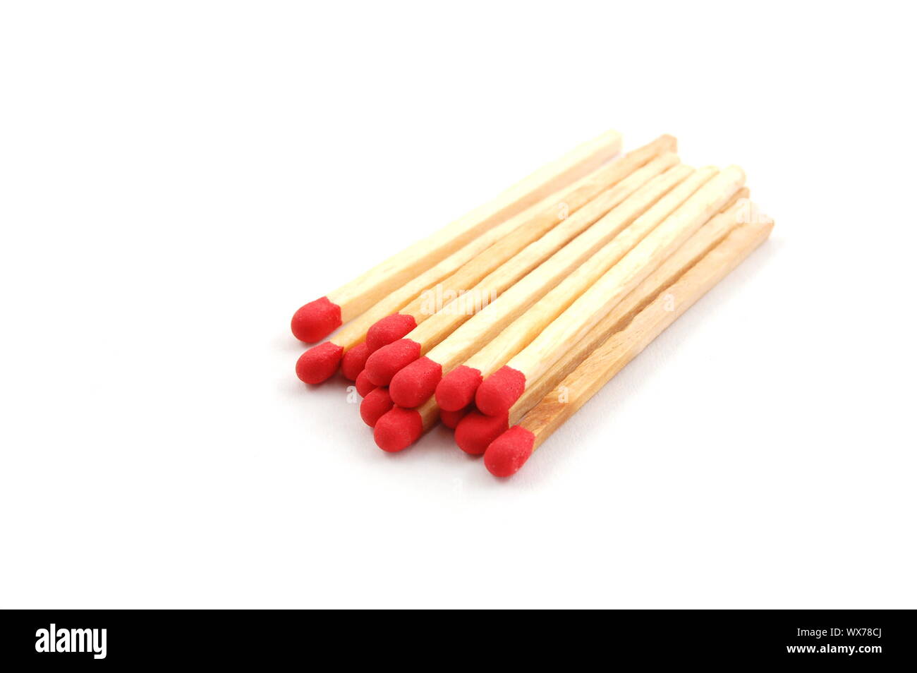 Some red matches isolated on a white background Stock Photo - Alamy