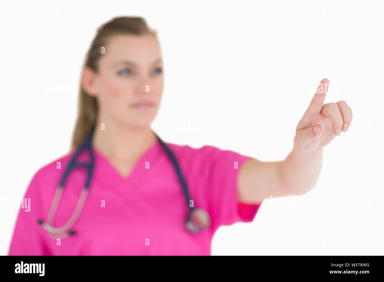 Female doctor in pink lab coat presenting something Stock Photo - Alamy