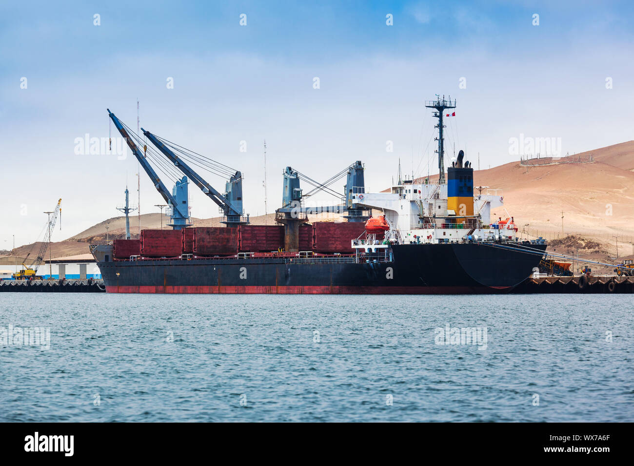 cargo ship in port, Peru Stock Photo - Alamy