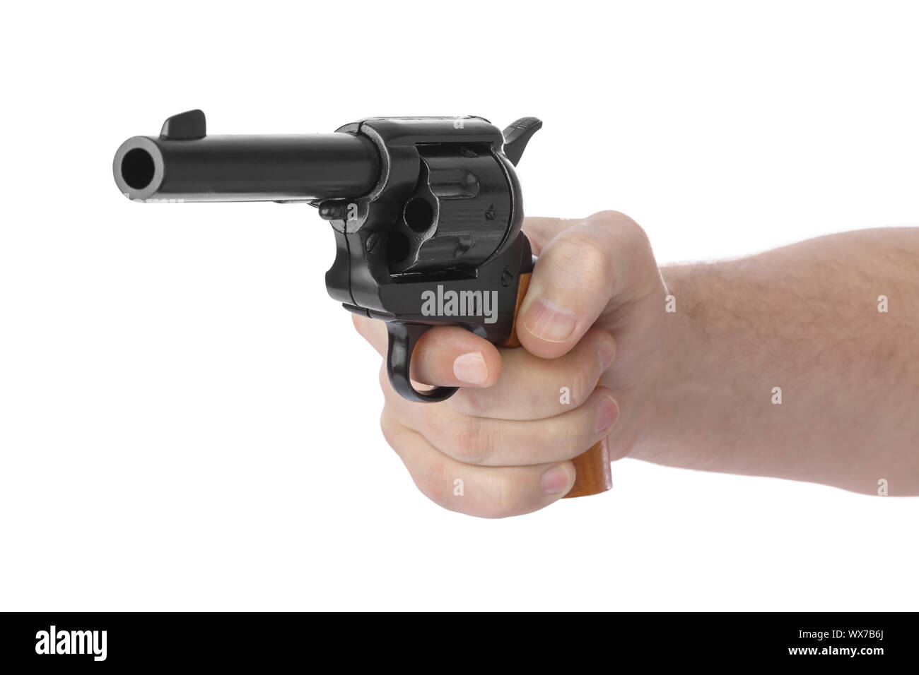 Hand with revolver Stock Photo - Alamy