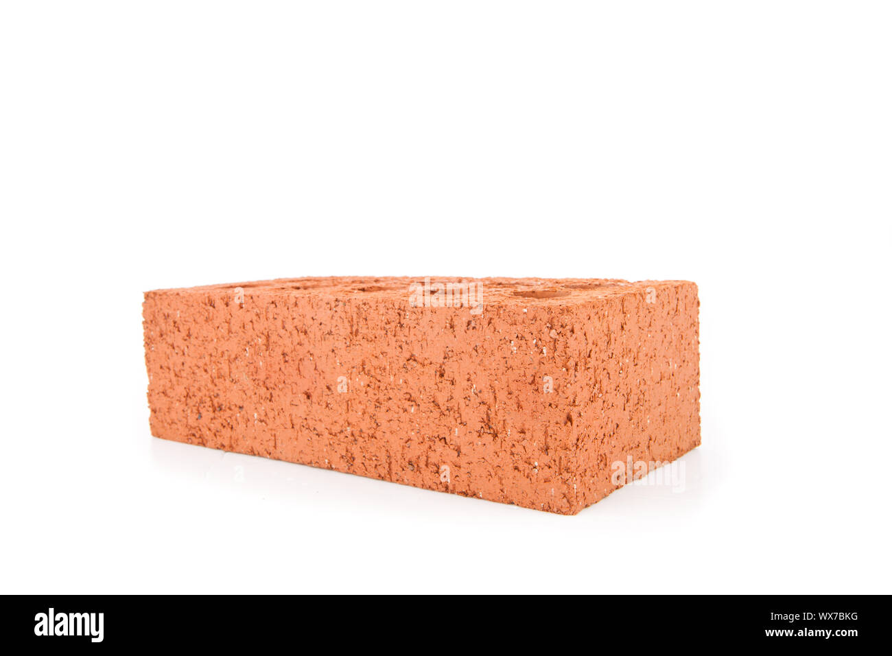 Red brick on white background Stock Photo - Alamy