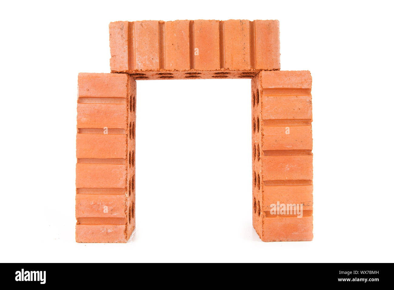 Three stacked red clay bricks Stock Photo - Alamy