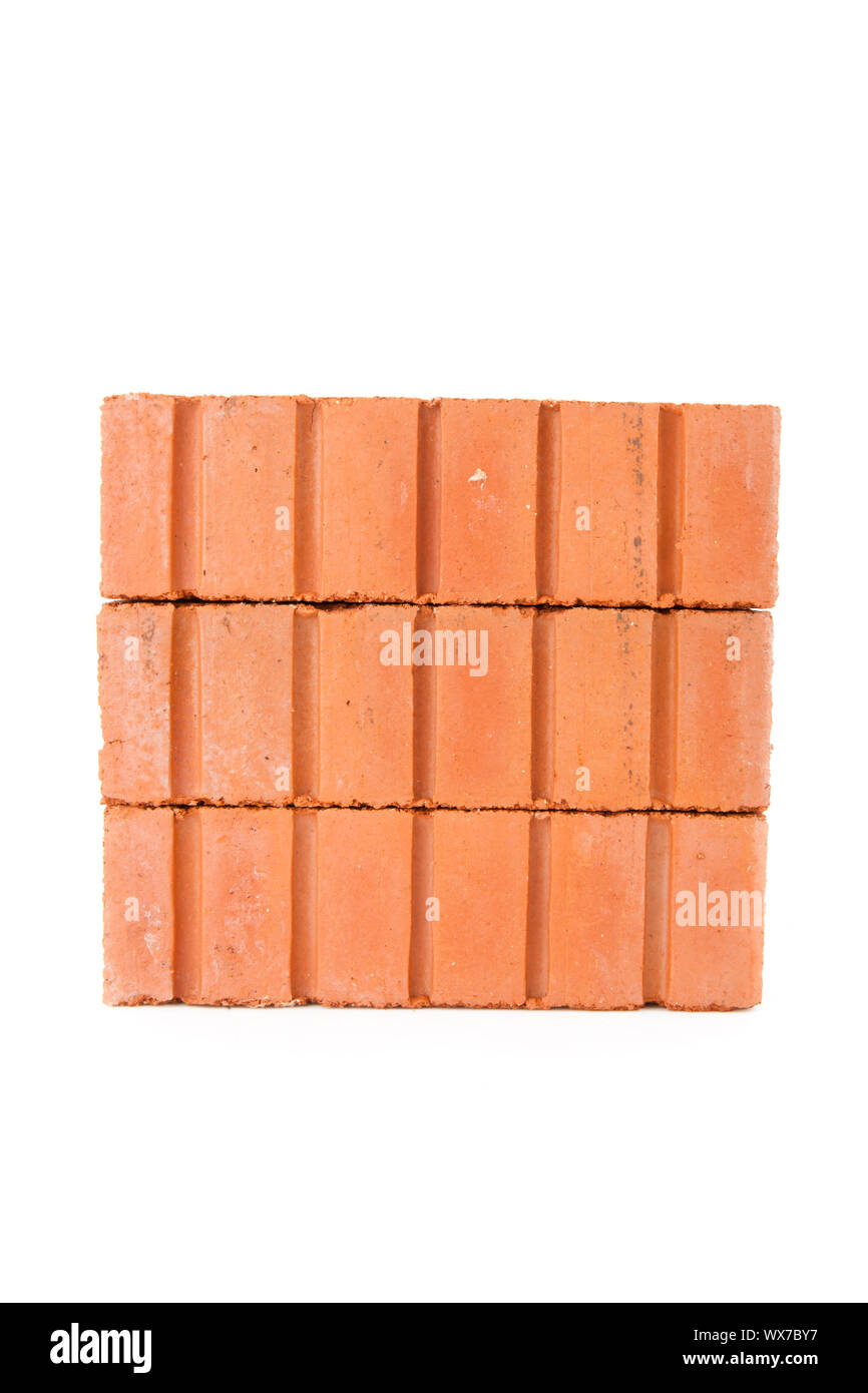 Small wall of stacked red bricks Stock Photo - Alamy