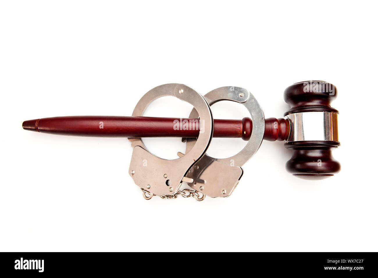 Gavel and handcuffs lying Stock Photo - Alamy