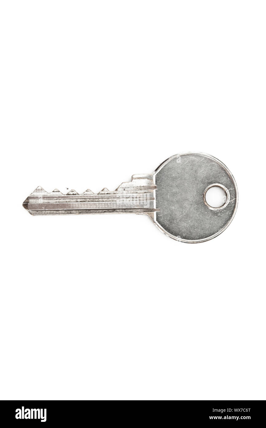 Silver key against white background Stock Photo - Alamy