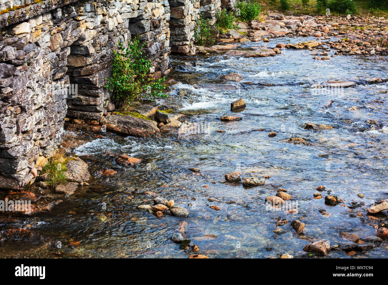 Beautiful old bridge over the river Stock Photo - Alamy