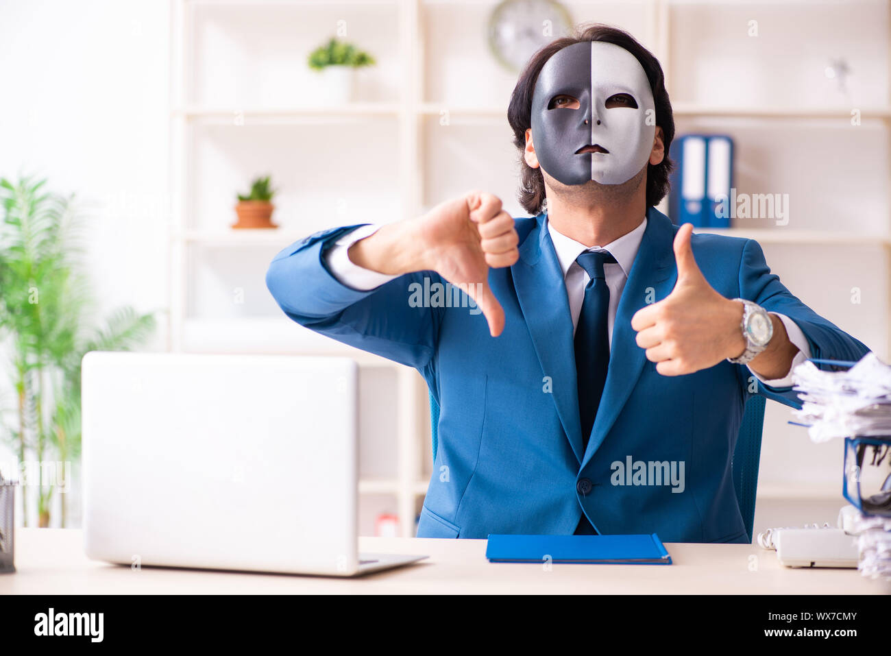Male employee in the office in industrial espionage concept Stock Photo ...