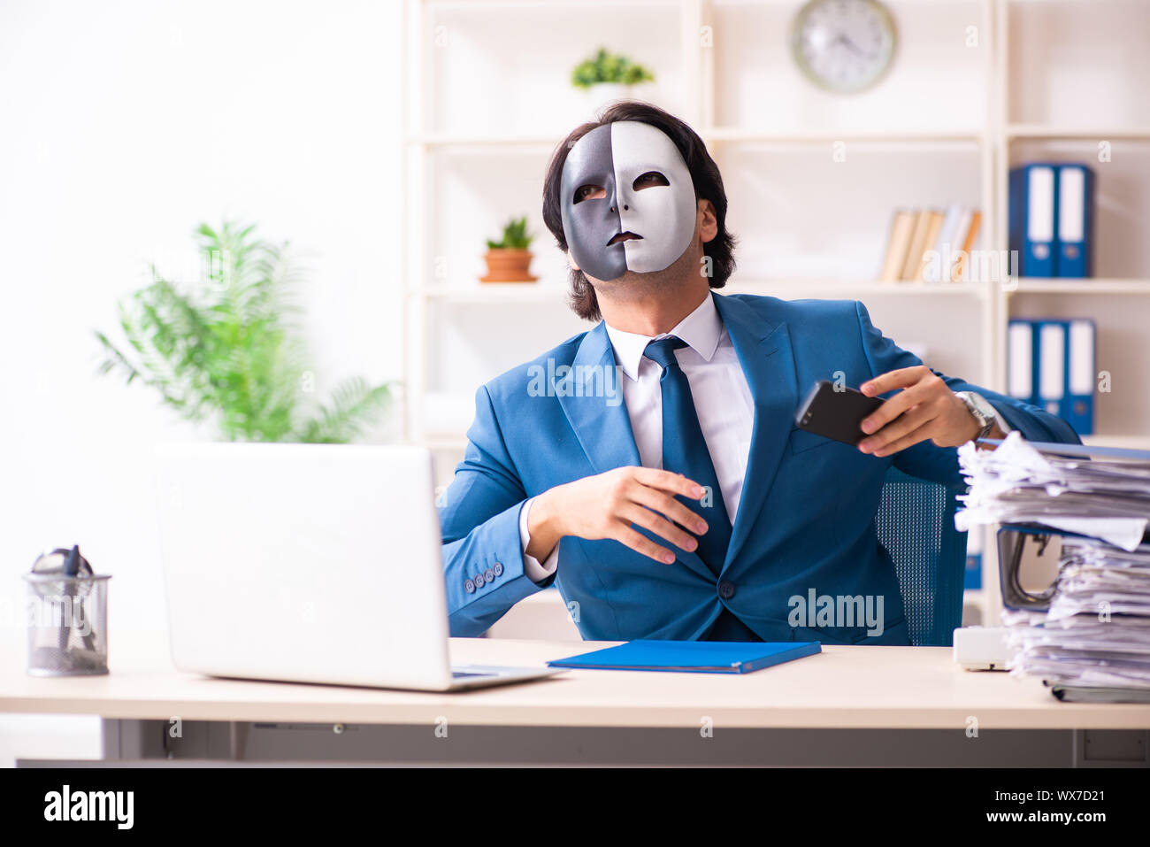 Male employee in the office in industrial espionage concept Stock Photo ...