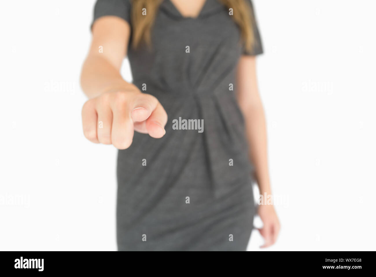 Female finger pointing on white background Stock Photo - Alamy