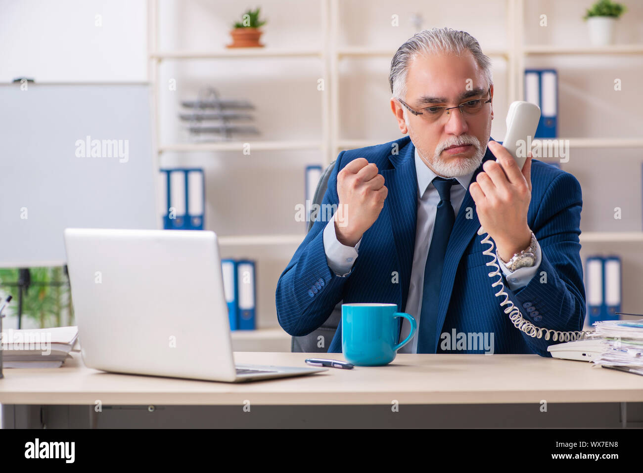 Irate Office Worker High Resolution Stock Photography and Images - Alamy