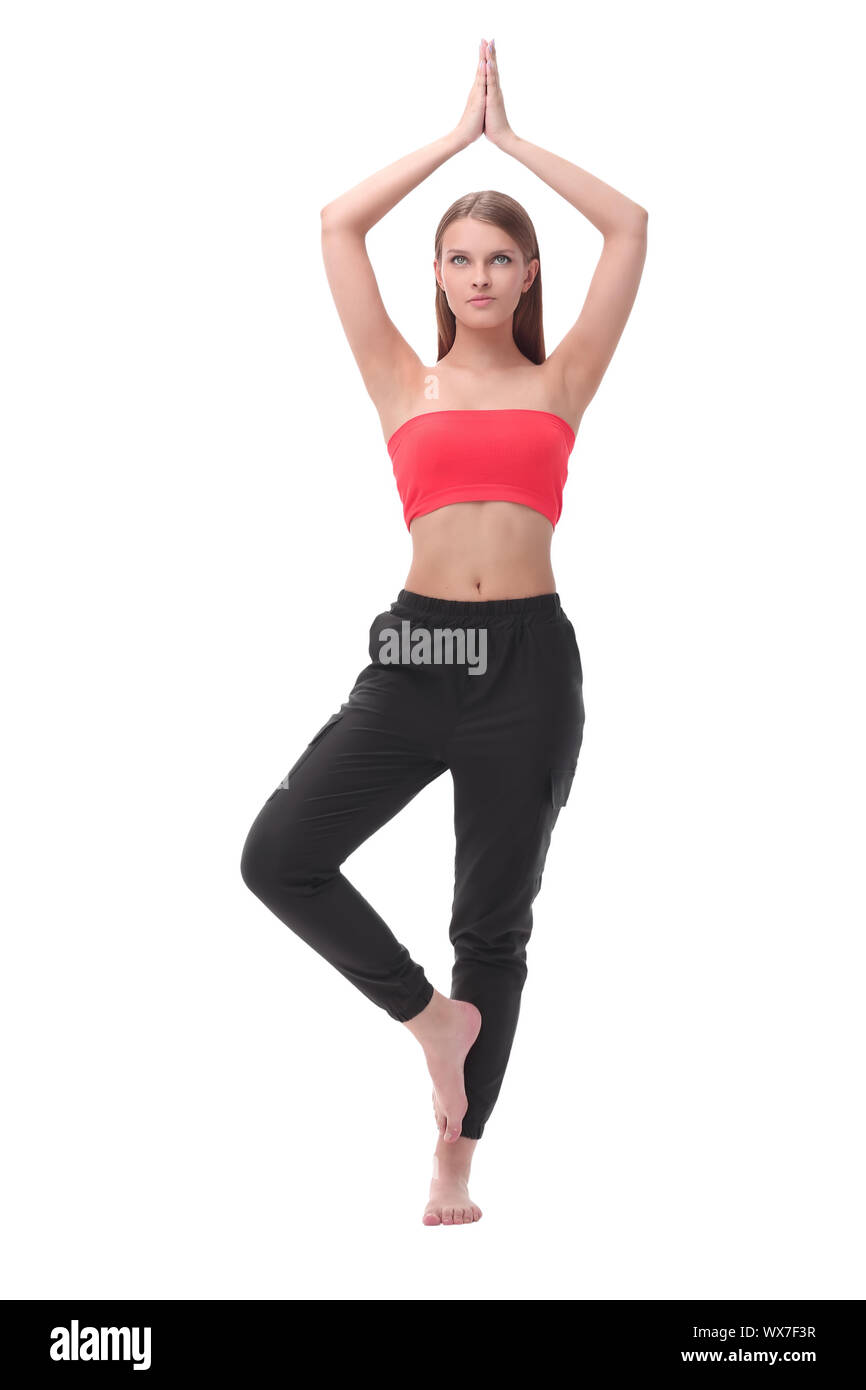 in full growth. young woman performing fitness exercises . isolated on ...