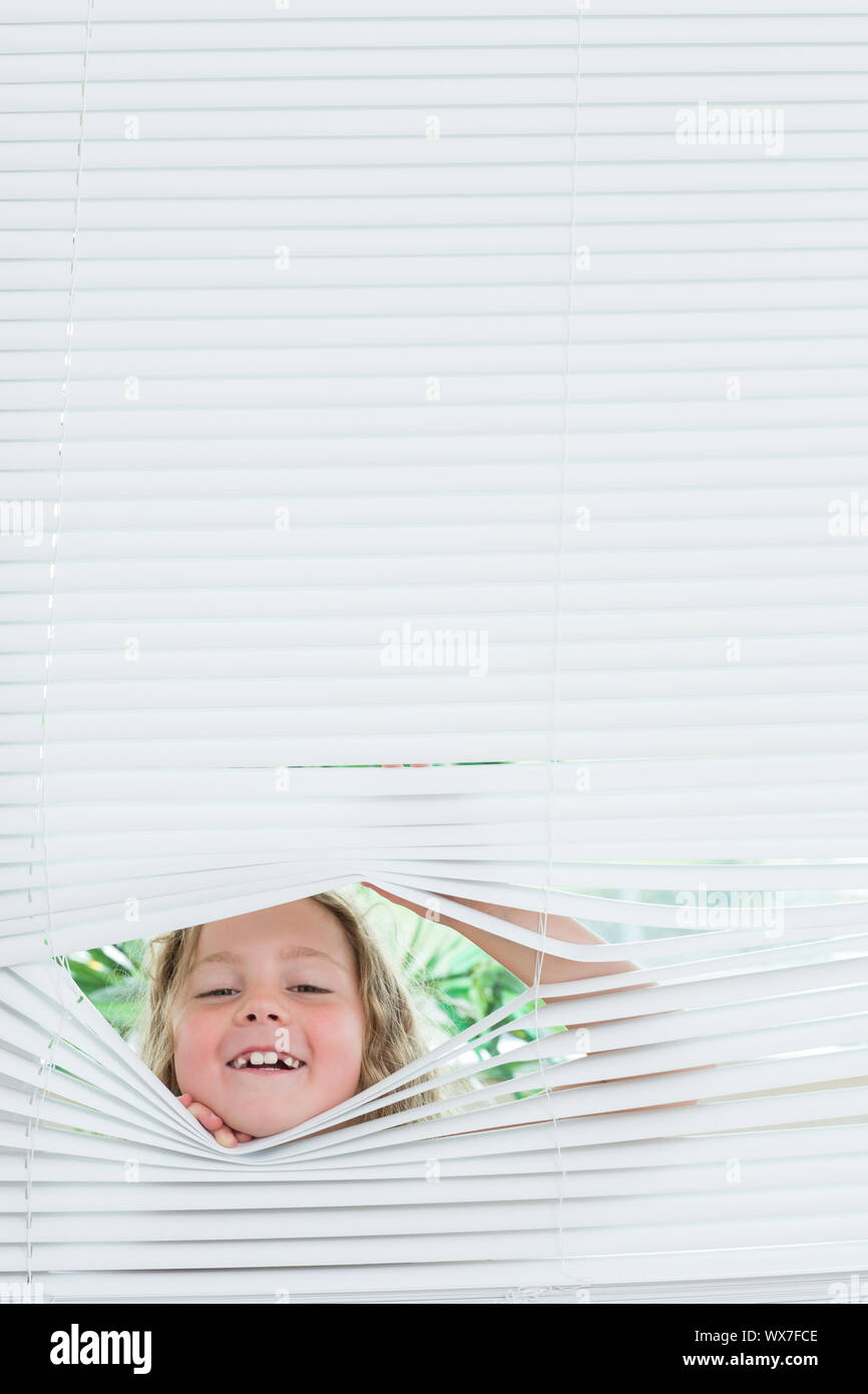 Female child peeking out hi-res stock photography and images - Alamy