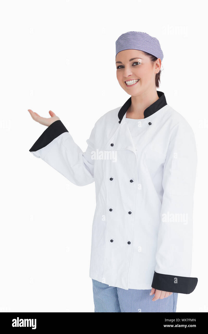 Happy chef showing something hi-res stock photography and images - Alamy