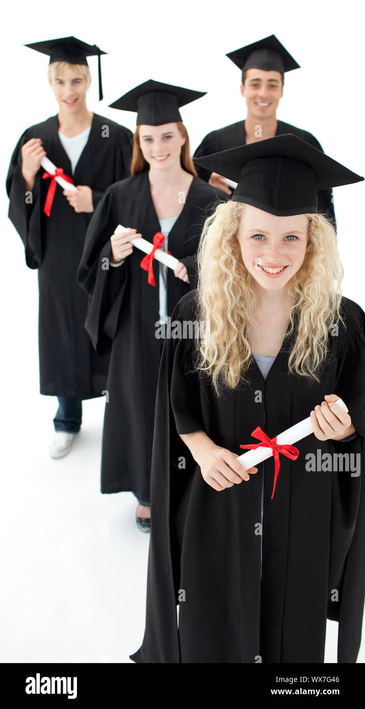 Smiling group of teenagers celebrating after Graduation Stock Photo - Alamy