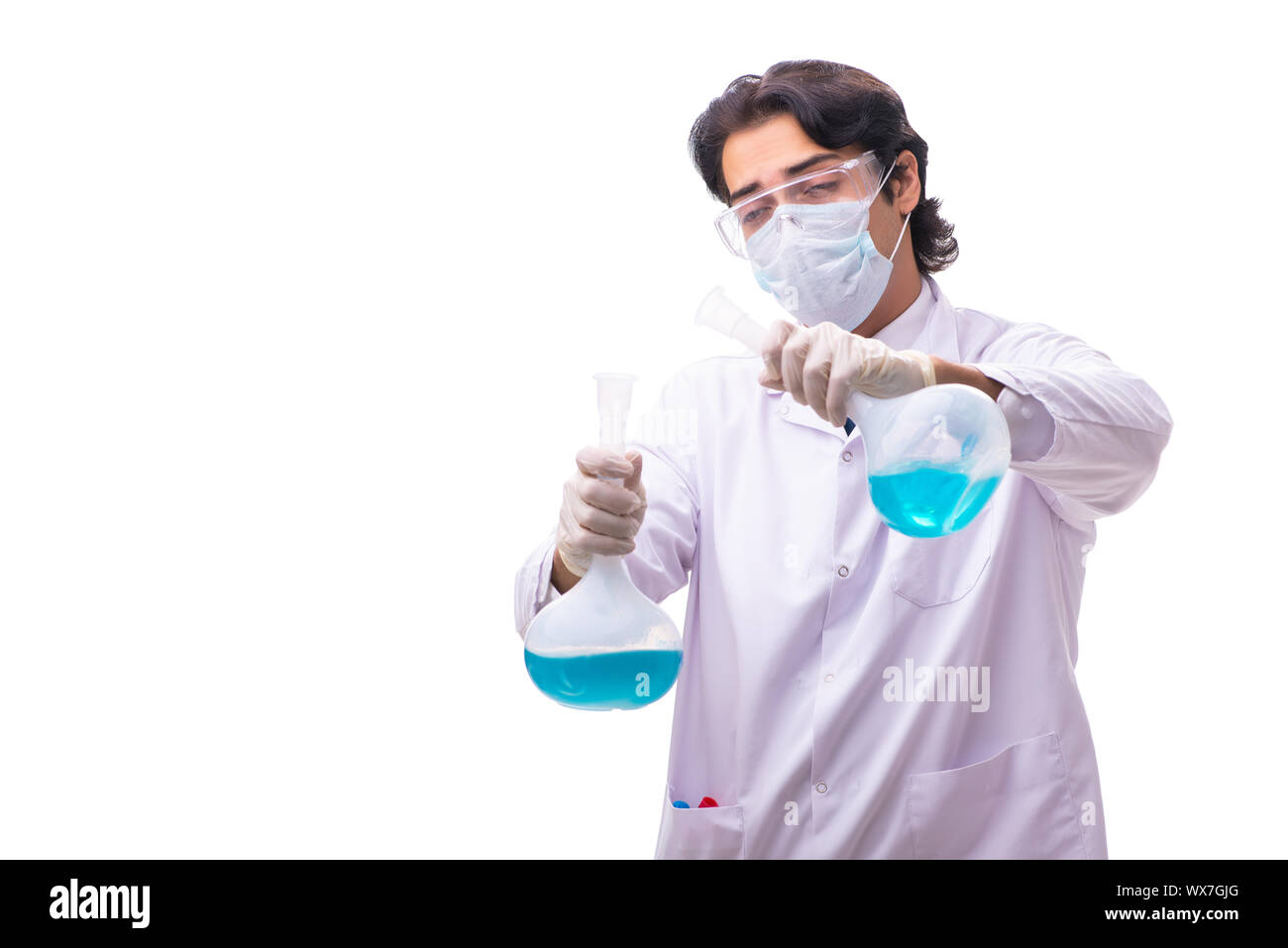 Young chemist isolated on white background Stock Photo - Alamy