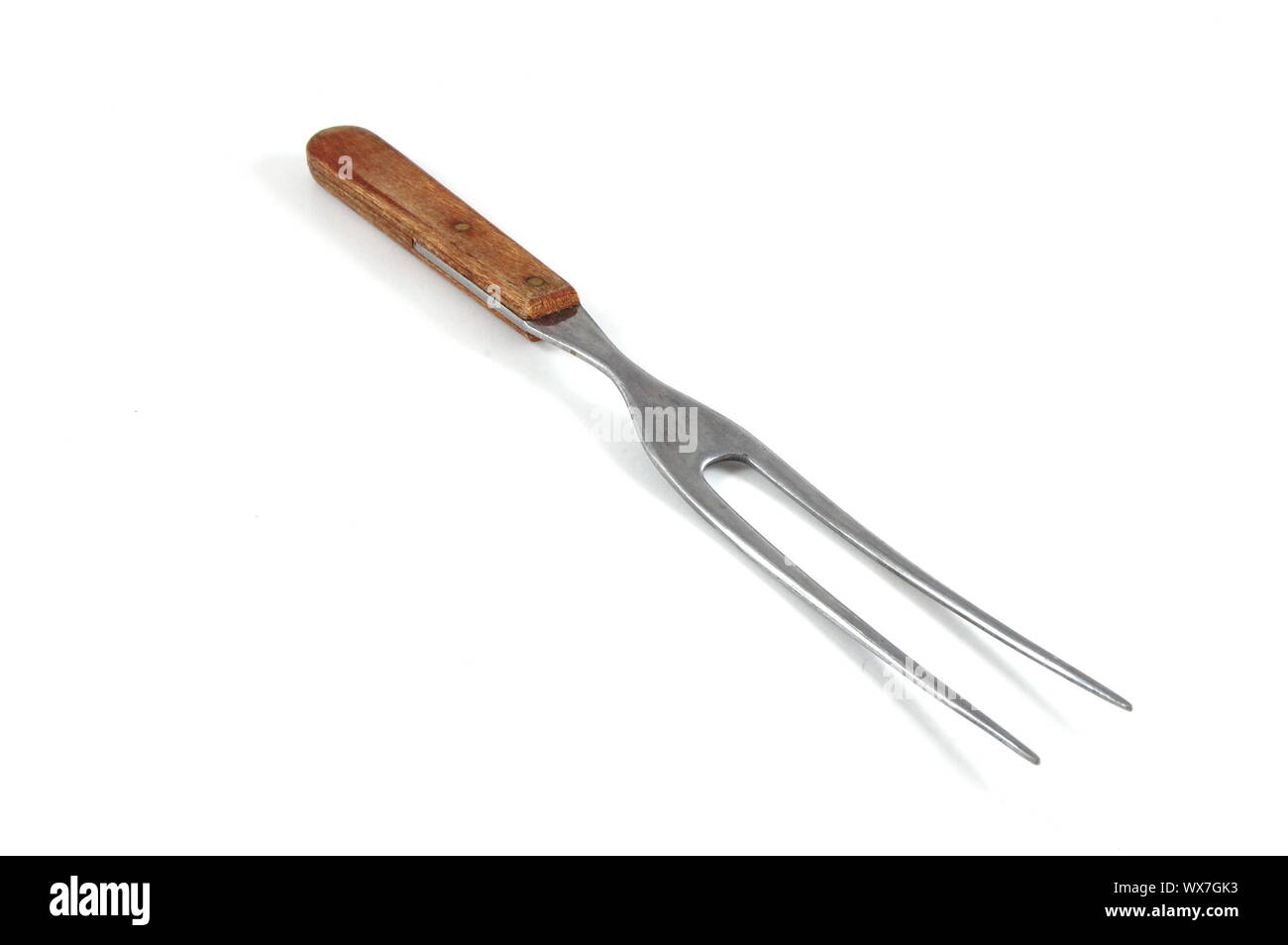 Fork with brown handle isolated on white background Stock Photo - Alamy
