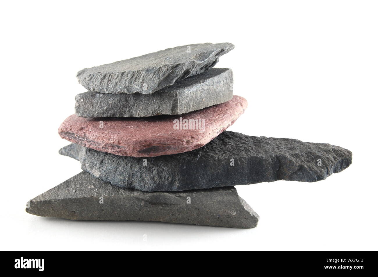 A tower made of stones isolated on a white background Stock Photo - Alamy