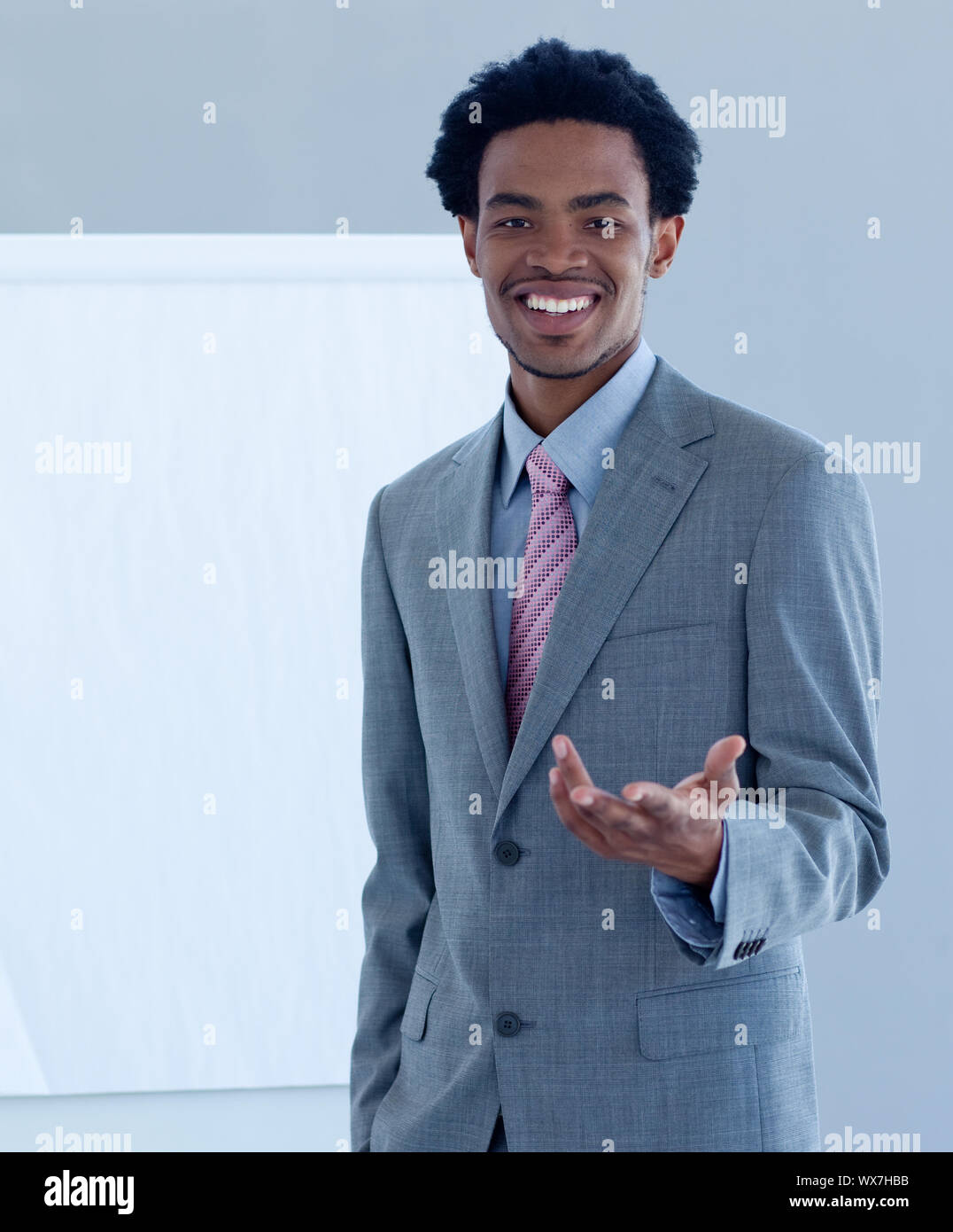 Afro-American businessman introducing stock market to his team Stock ...