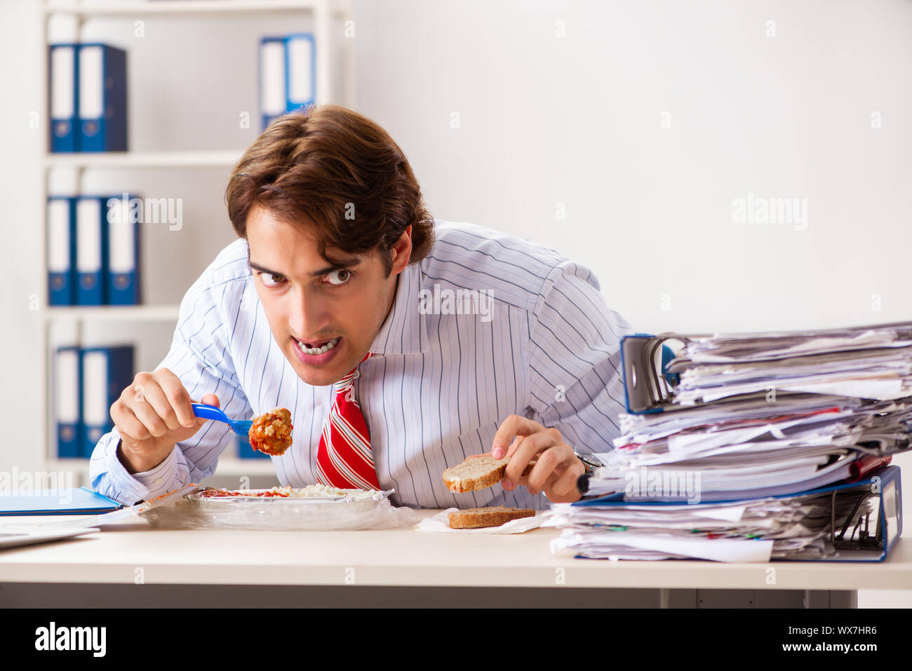 Man having dinner laptop hi-res stock photography and images - Alamy
