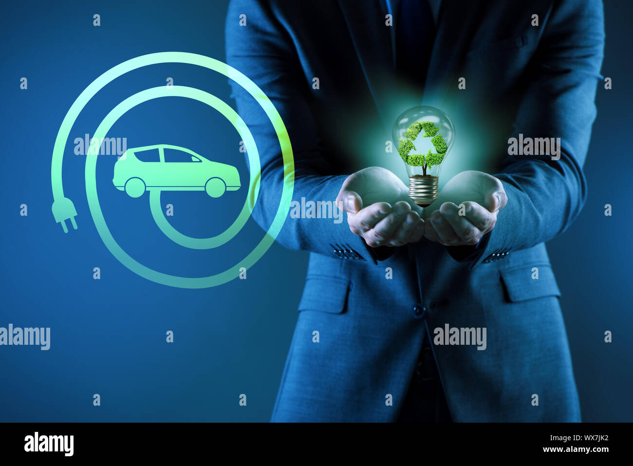 Electric vehicle concept with lightbulb Stock Photo - Alamy