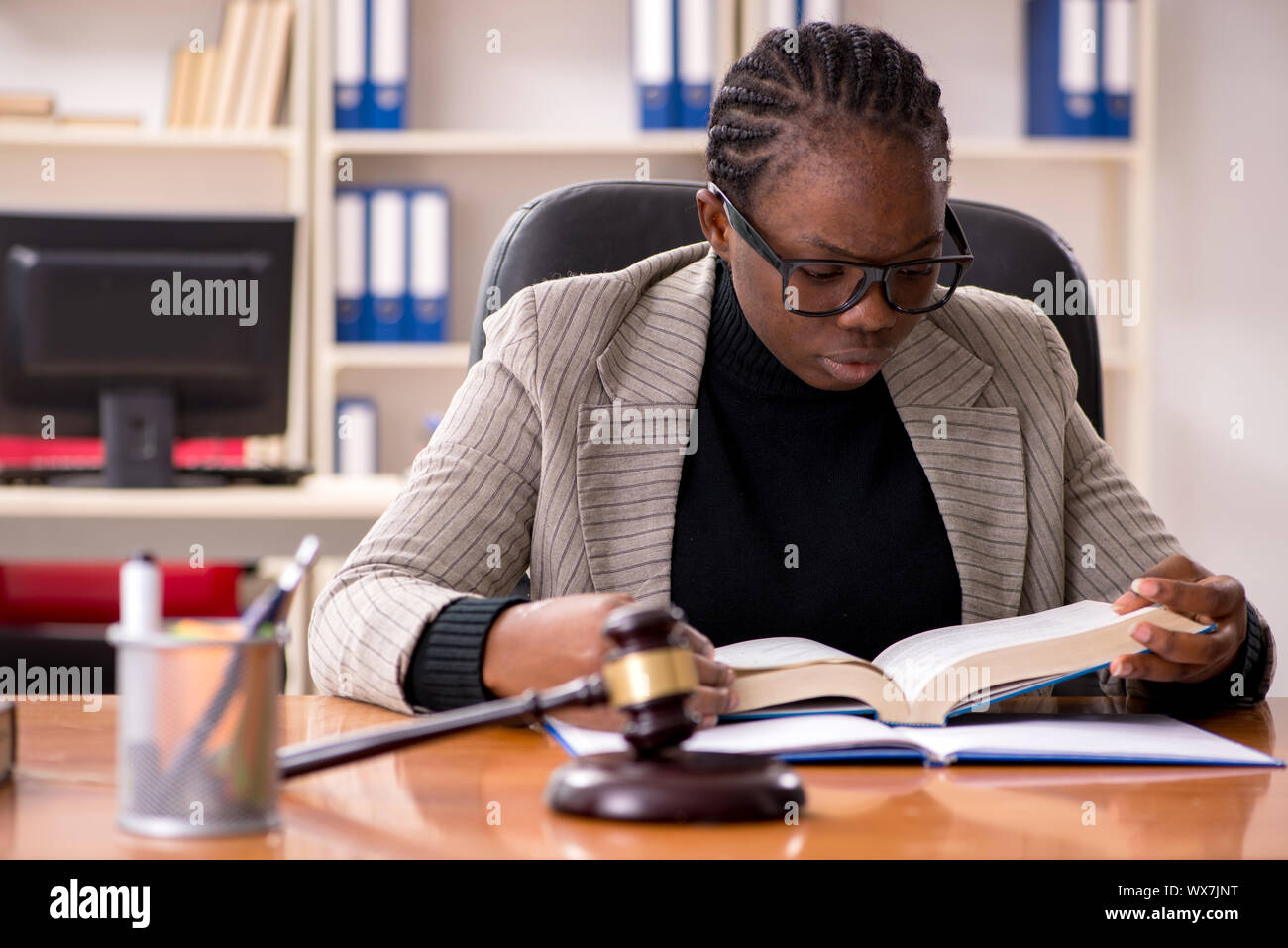 Black female lawyer in courthouse Stock Photo - Alamy