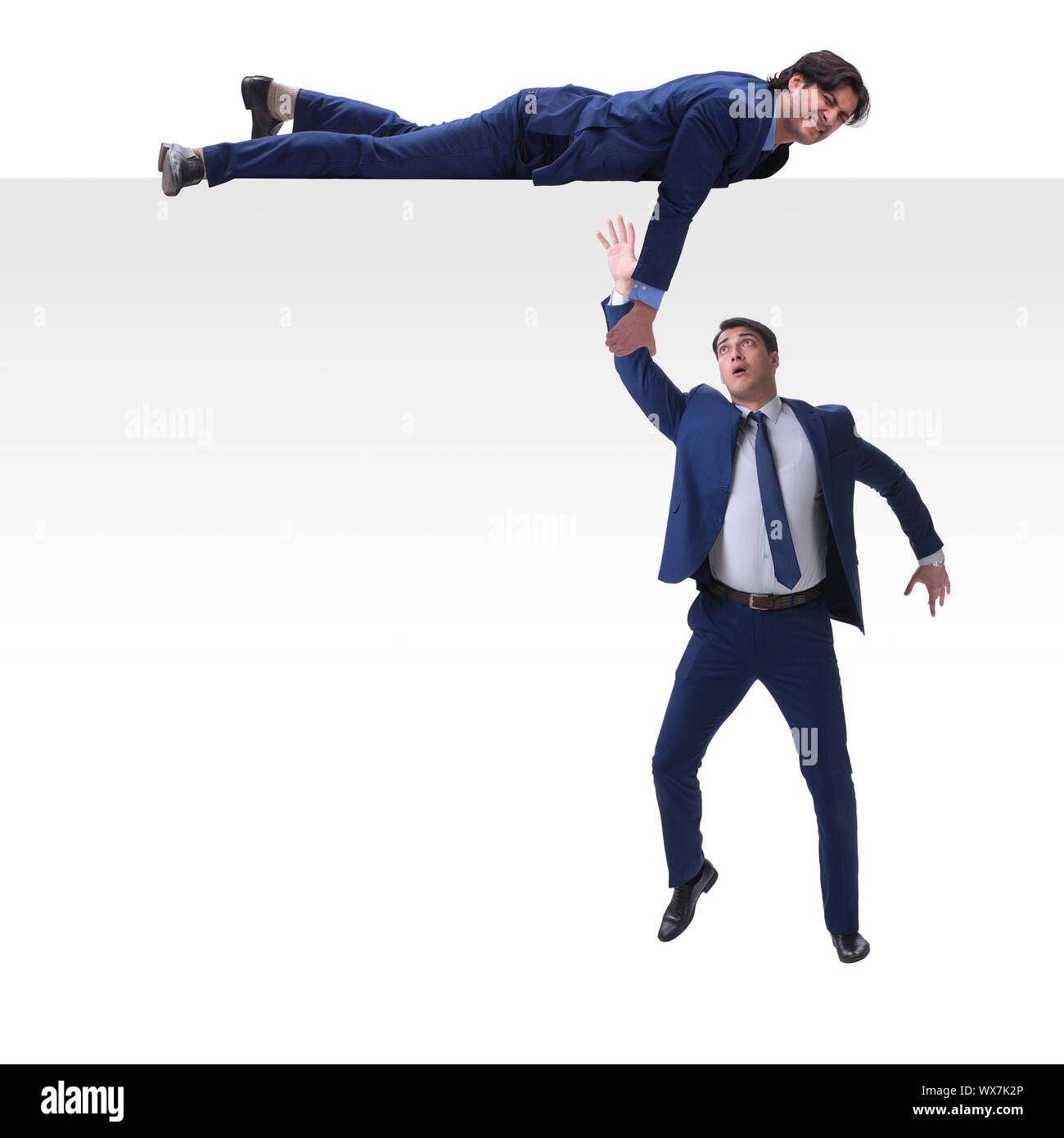 Businessman helping colleague Cut Out Stock Images & Pictures - Alamy