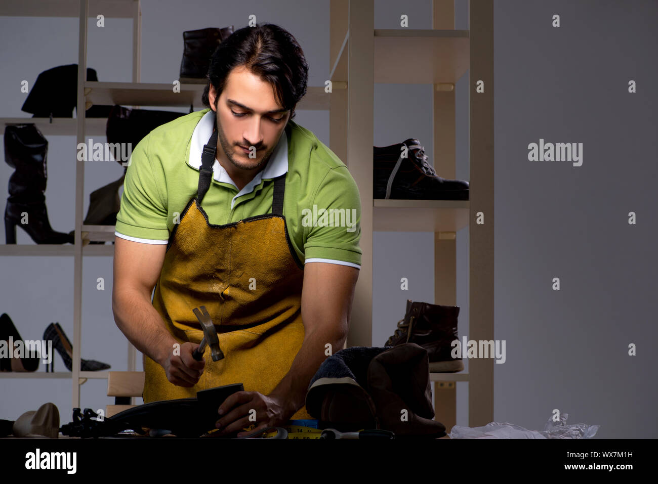 Sho maker hi-res stock photography and images - Alamy