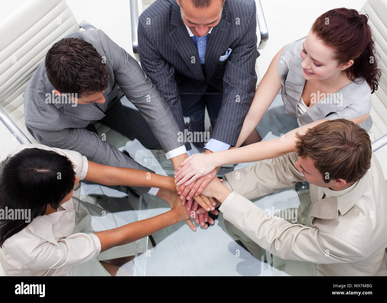 High angle of business team with hands together. Concept of teamwork ...