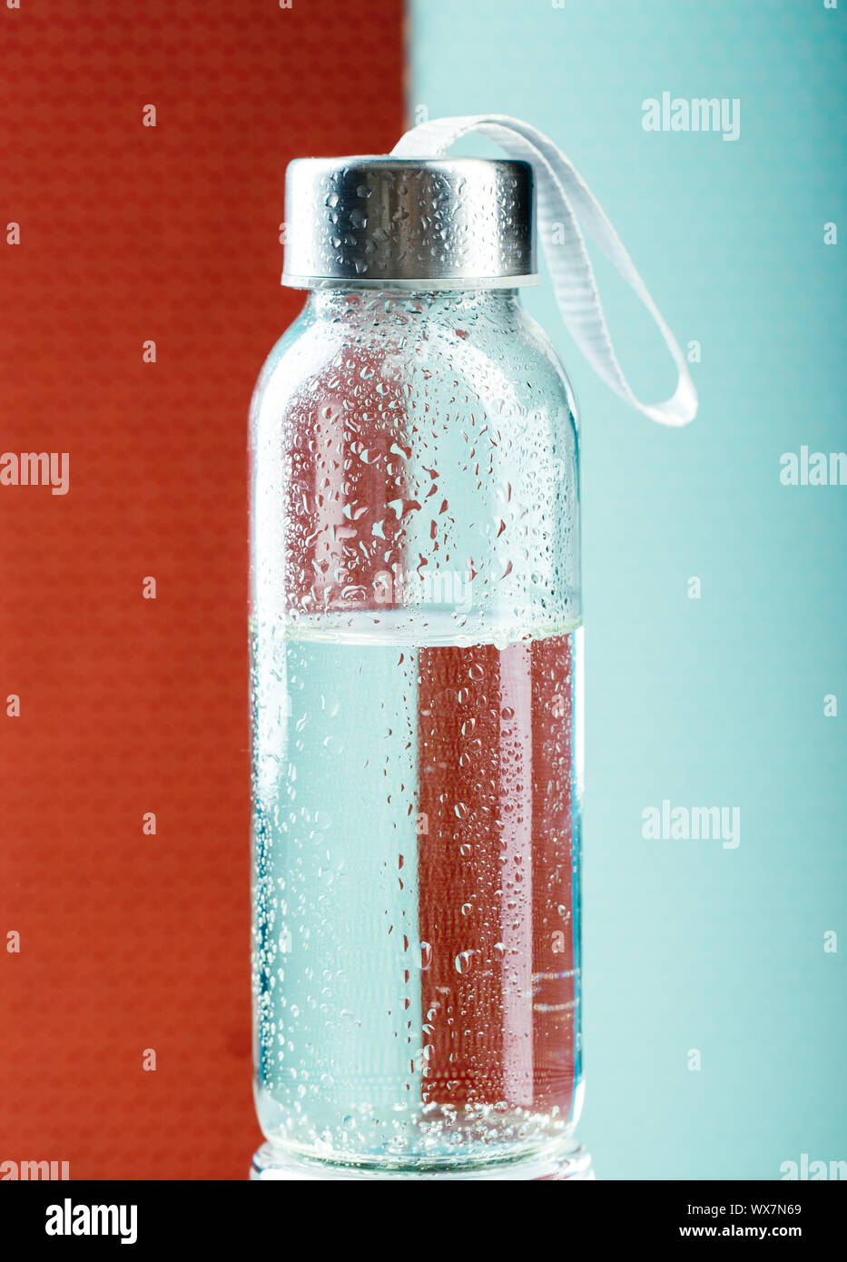 Small glass water bottle Stock Photo - Alamy