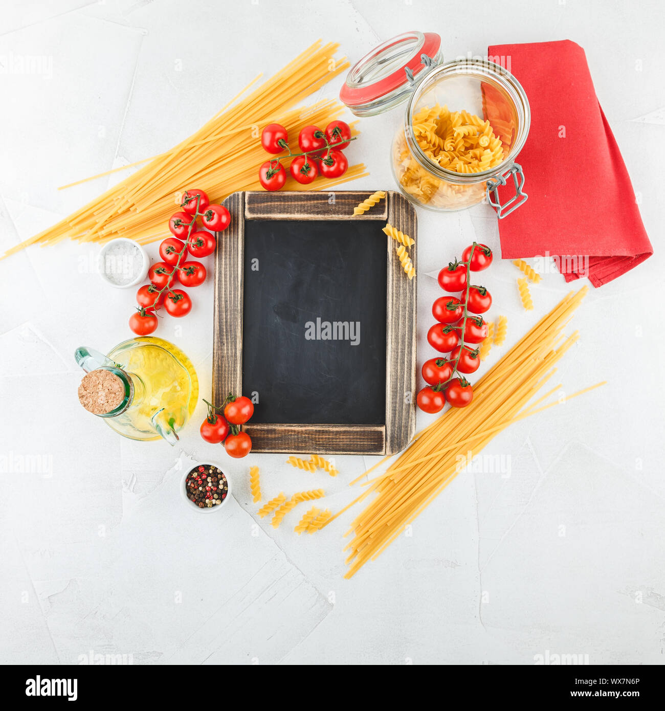 Chalk board with copy space with Ingredients for cooking Italian pasta ...