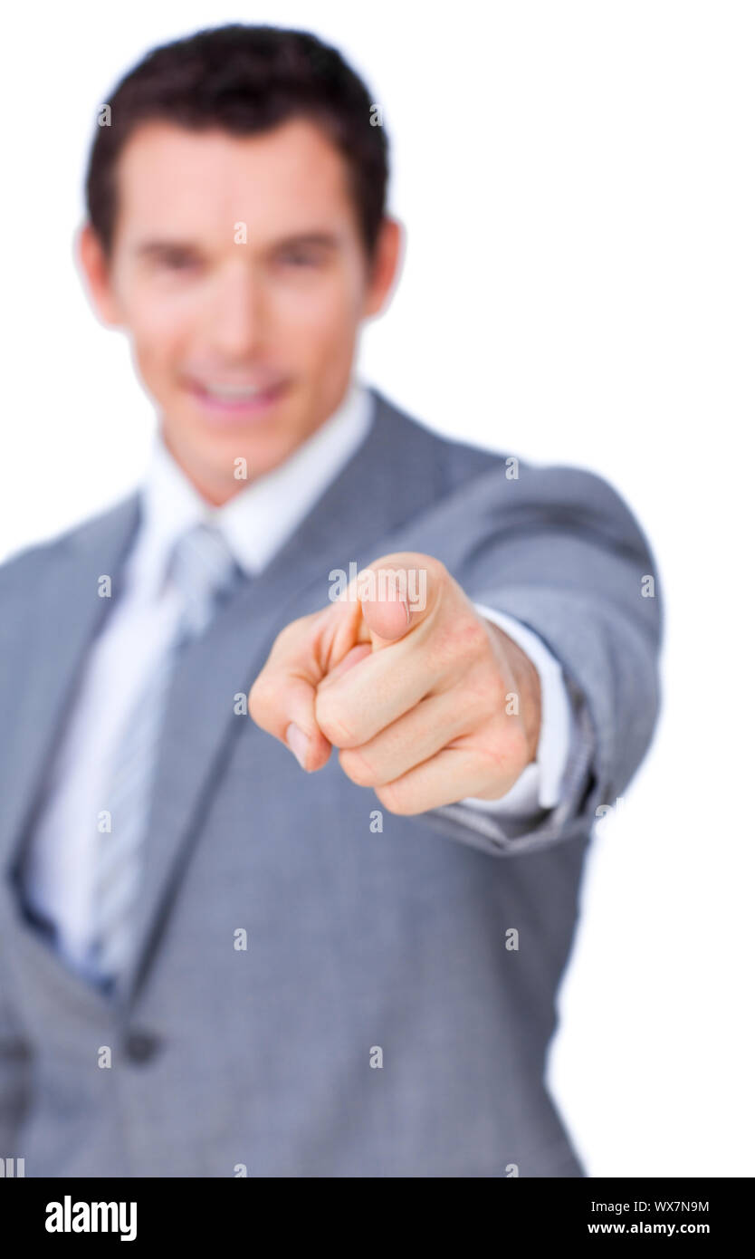 Positive businessman pointing at the camera isolated on a white ...