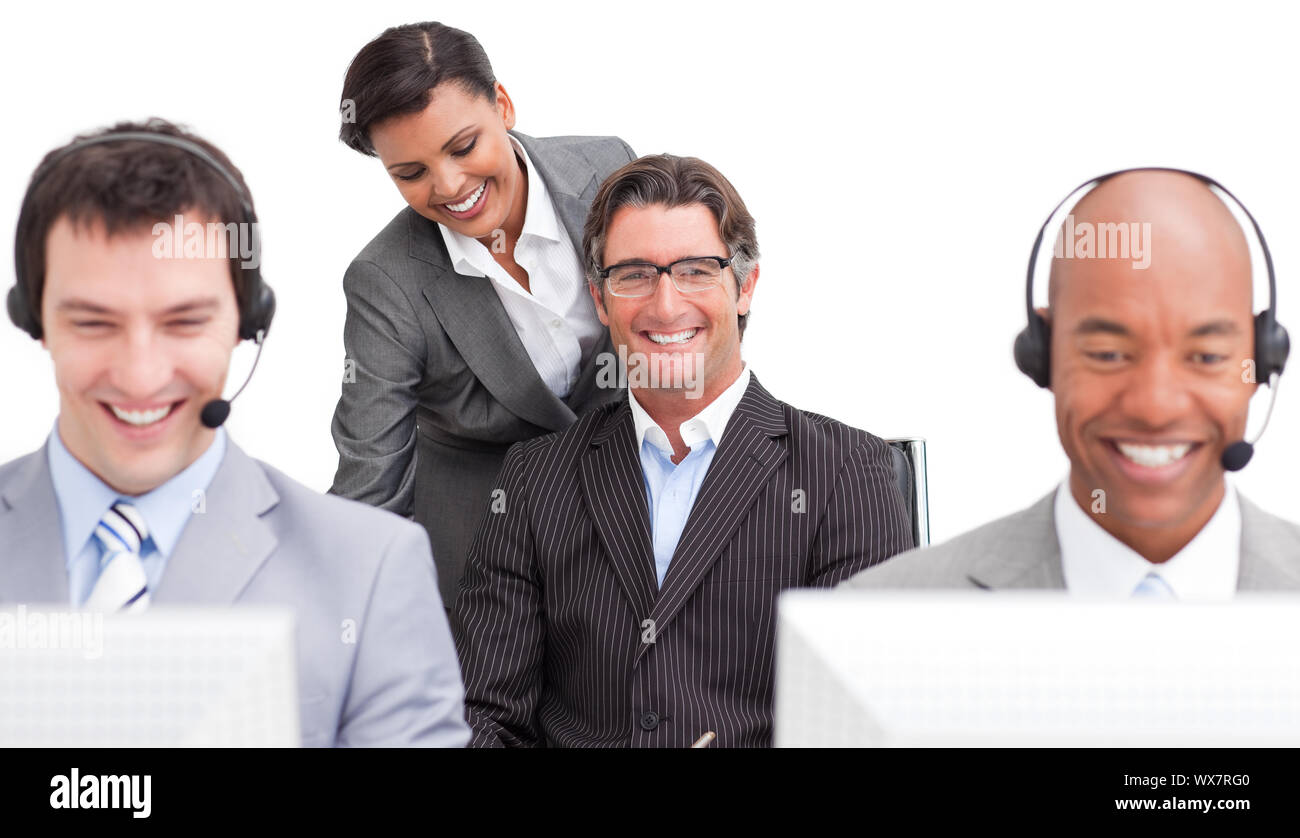 Successful customer agent team working in the office against a white ...