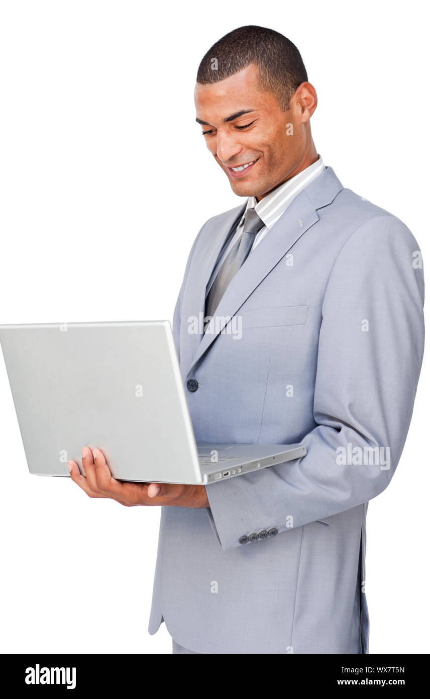 Young businessman using a laptop against a white background Stock Photo ...