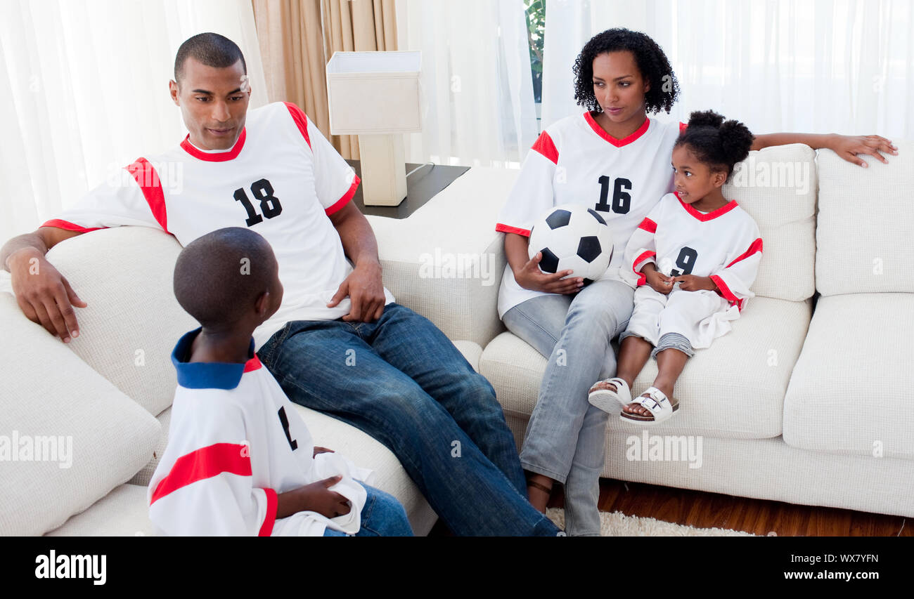 Kids watching football on tv hi-res stock photography and images - Alamy
