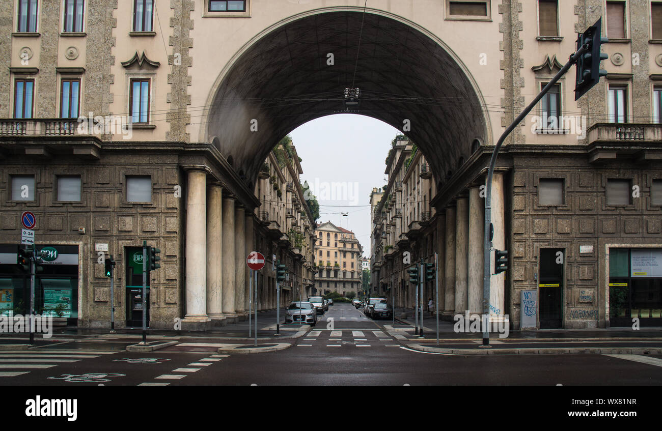 huge gate with street through building Stock Photo - Alamy
