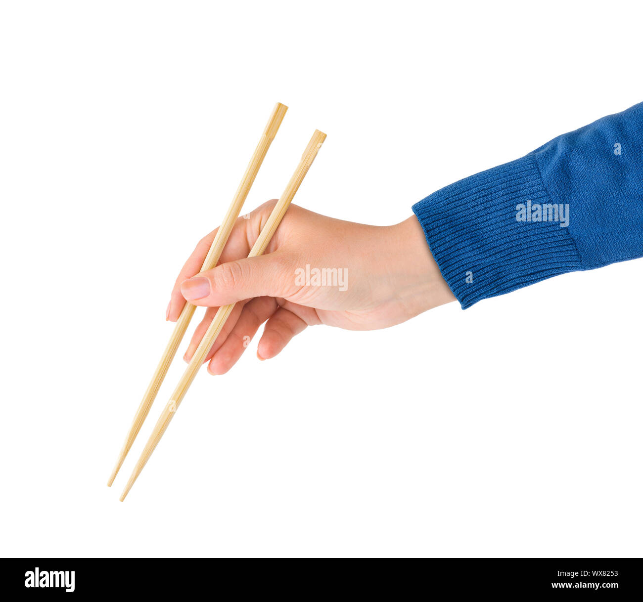 Hand with chopsticks Stock Photo - Alamy