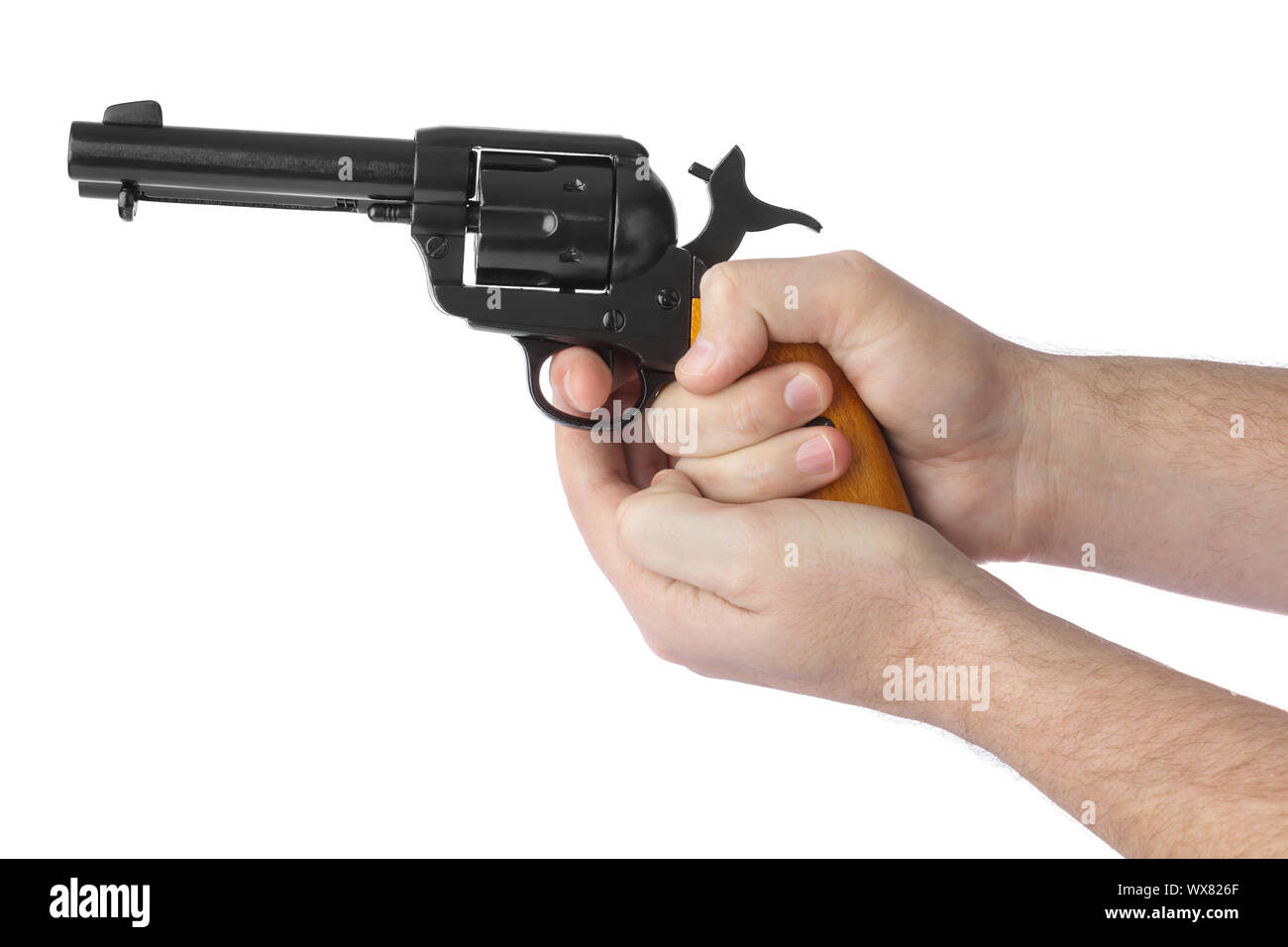 Hands with revolver Stock Photo - Alamy