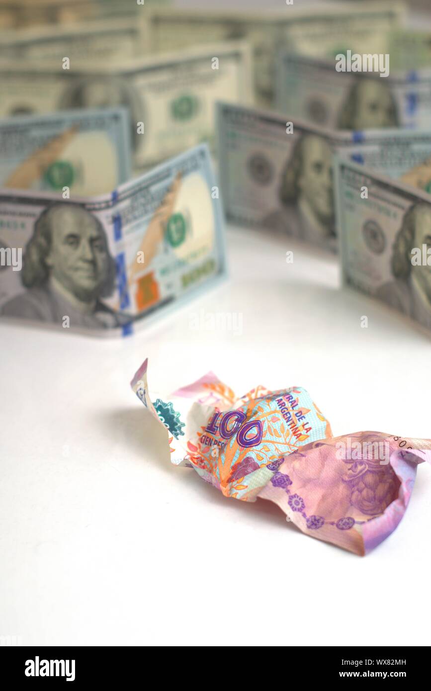 Argentina economic crisis and currency devaluation. Crumpled ...