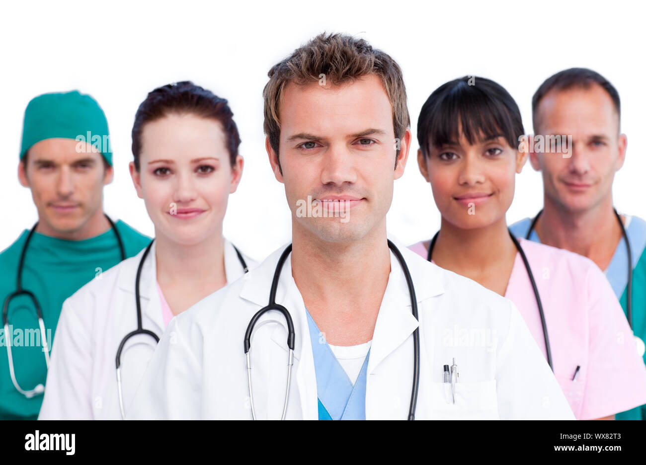 Portrait of a concentrated medical team against a white background ...
