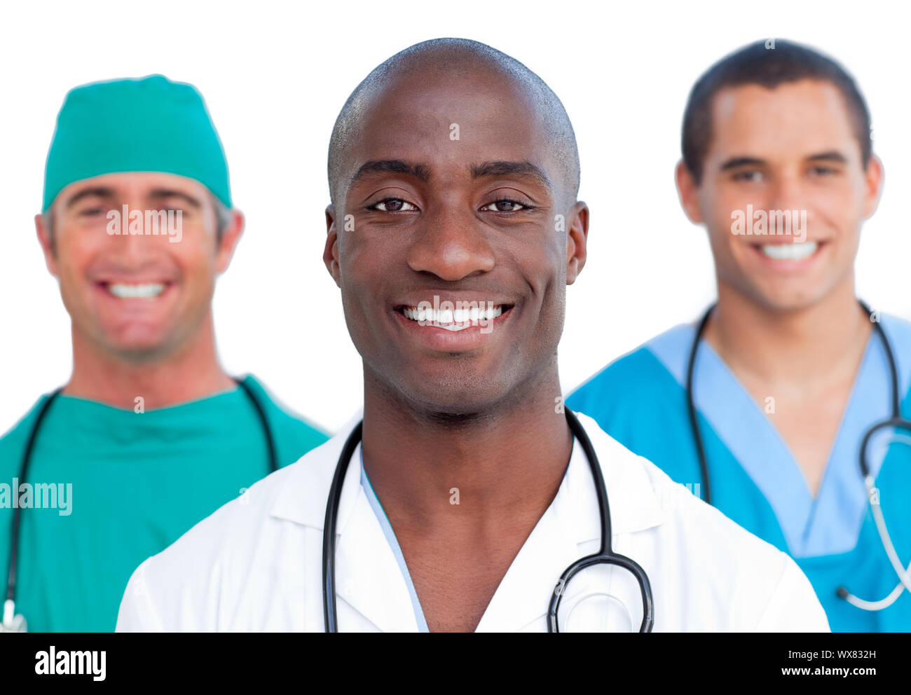 Portrait of three male doctors against a white background Stock Photo ...