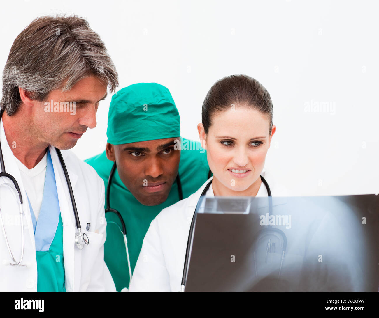 Medical team examining an x-ray in the hospital Stock Photo - Alamy