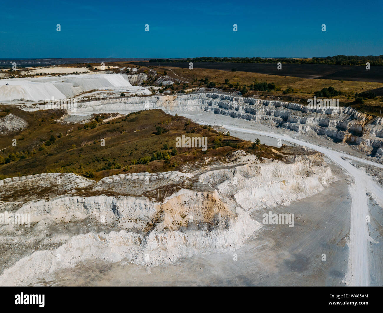 Open chalky quarry, aerial view from drone Stock Photo - Alamy