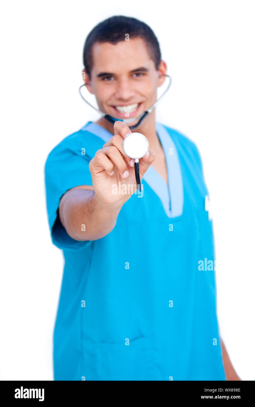 Self-assured male doctor wearing blue uniform holding a stethoscope ...