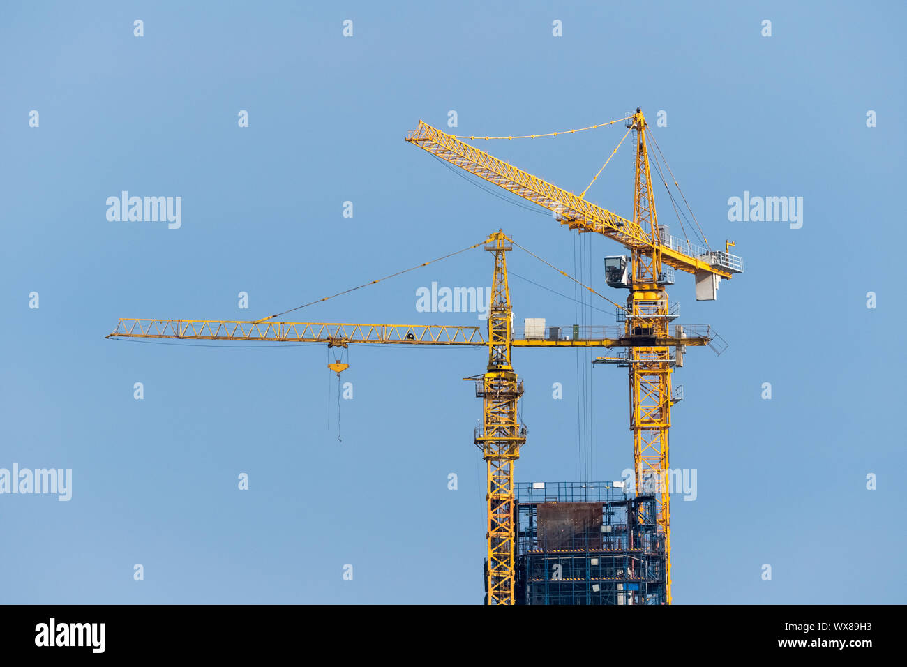 High tower cranes work on hi-res stock photography and images - Alamy